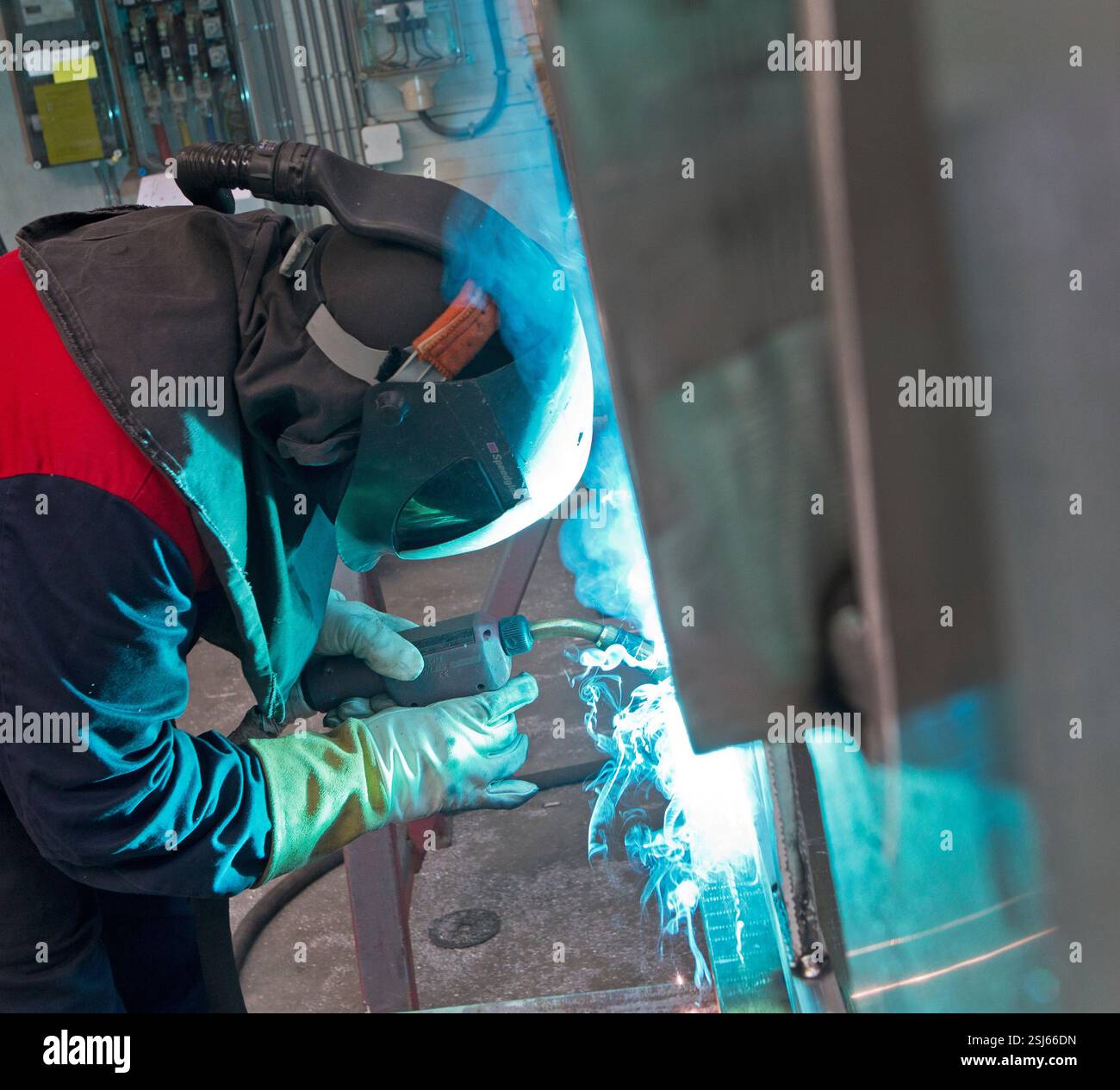 Welder at work welding aluminium. Shipbuilding Industry. Aluminium hull ...