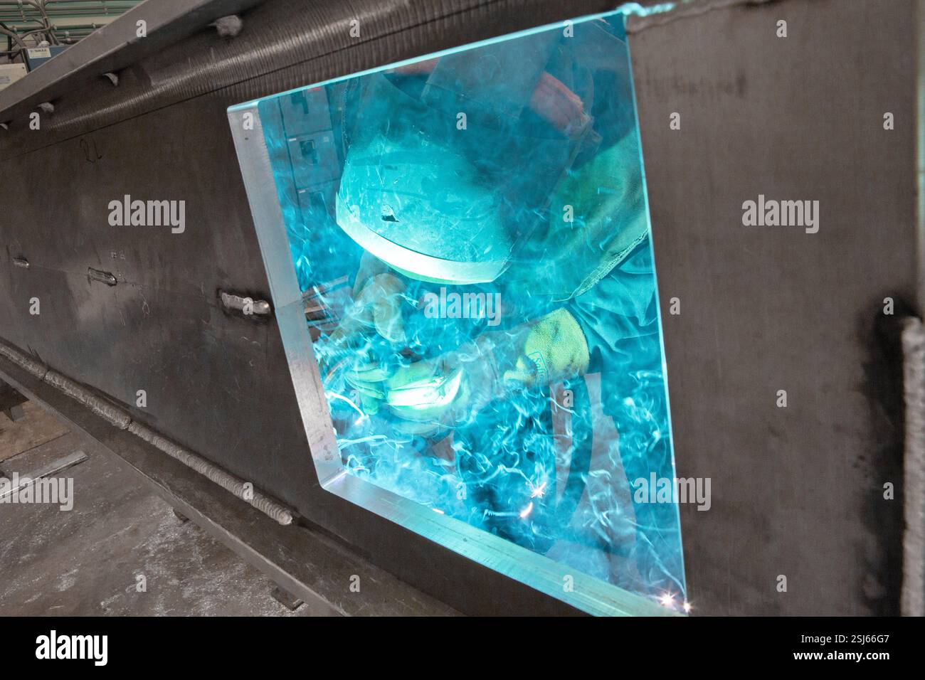 Welder at work welding aluminium. Shipbuilding Industry. Aluminium hull ...