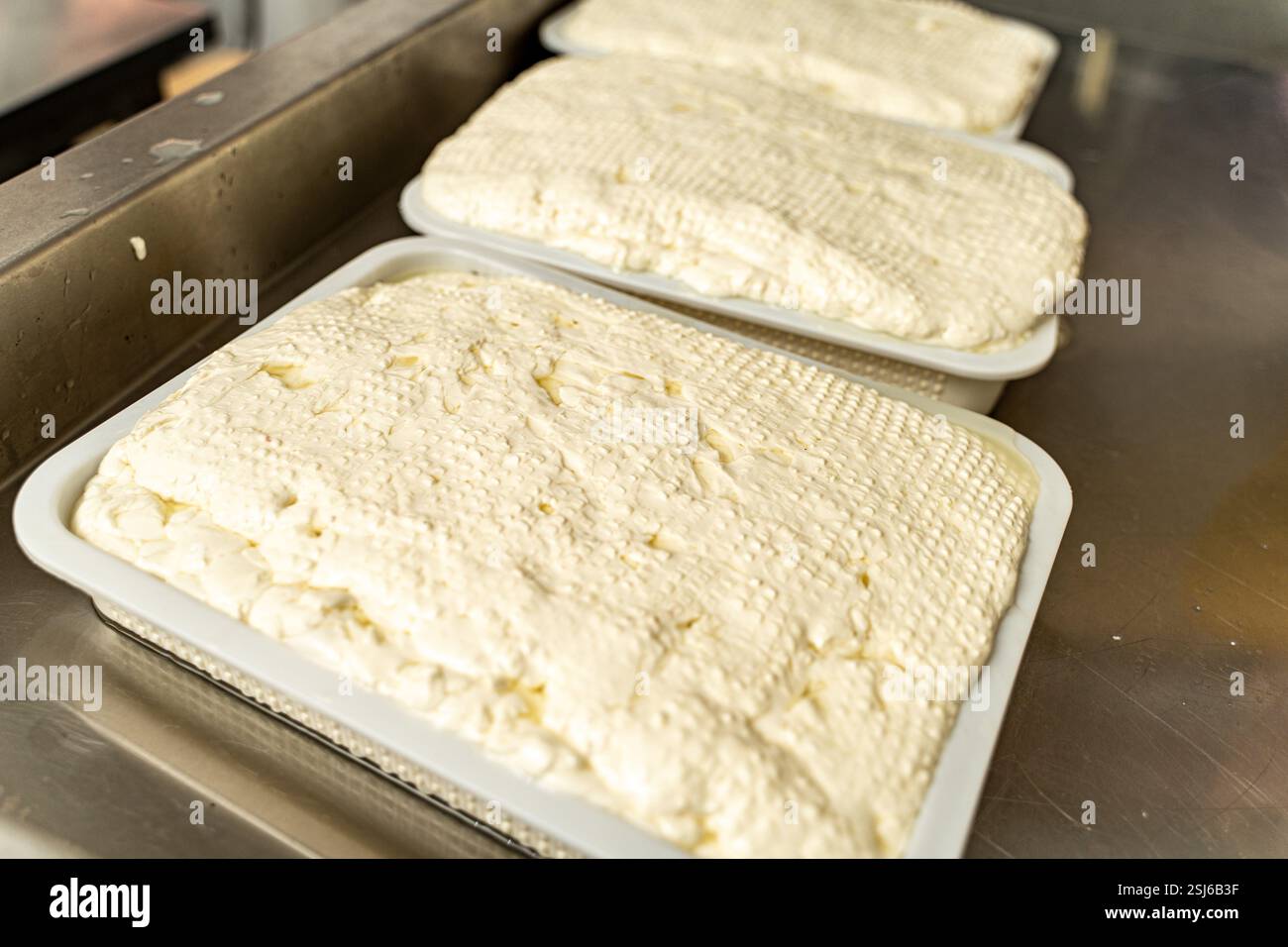 Maturation of Italian mozzarella cheese. Close-up. High quality photo ...