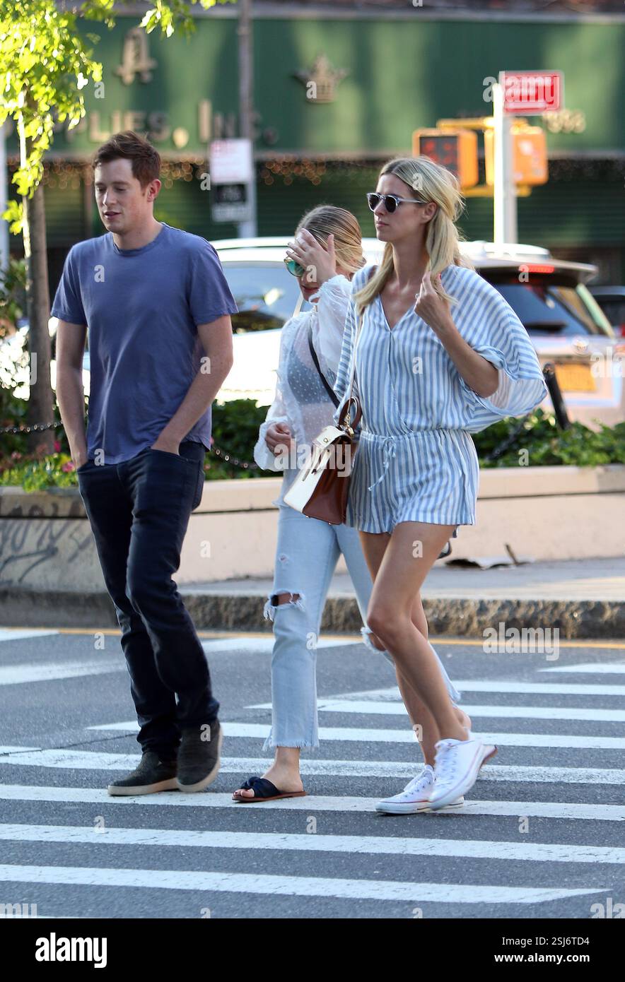 Nicky Hilton Rothschild and her husband James Rothschild walk in Soho ...