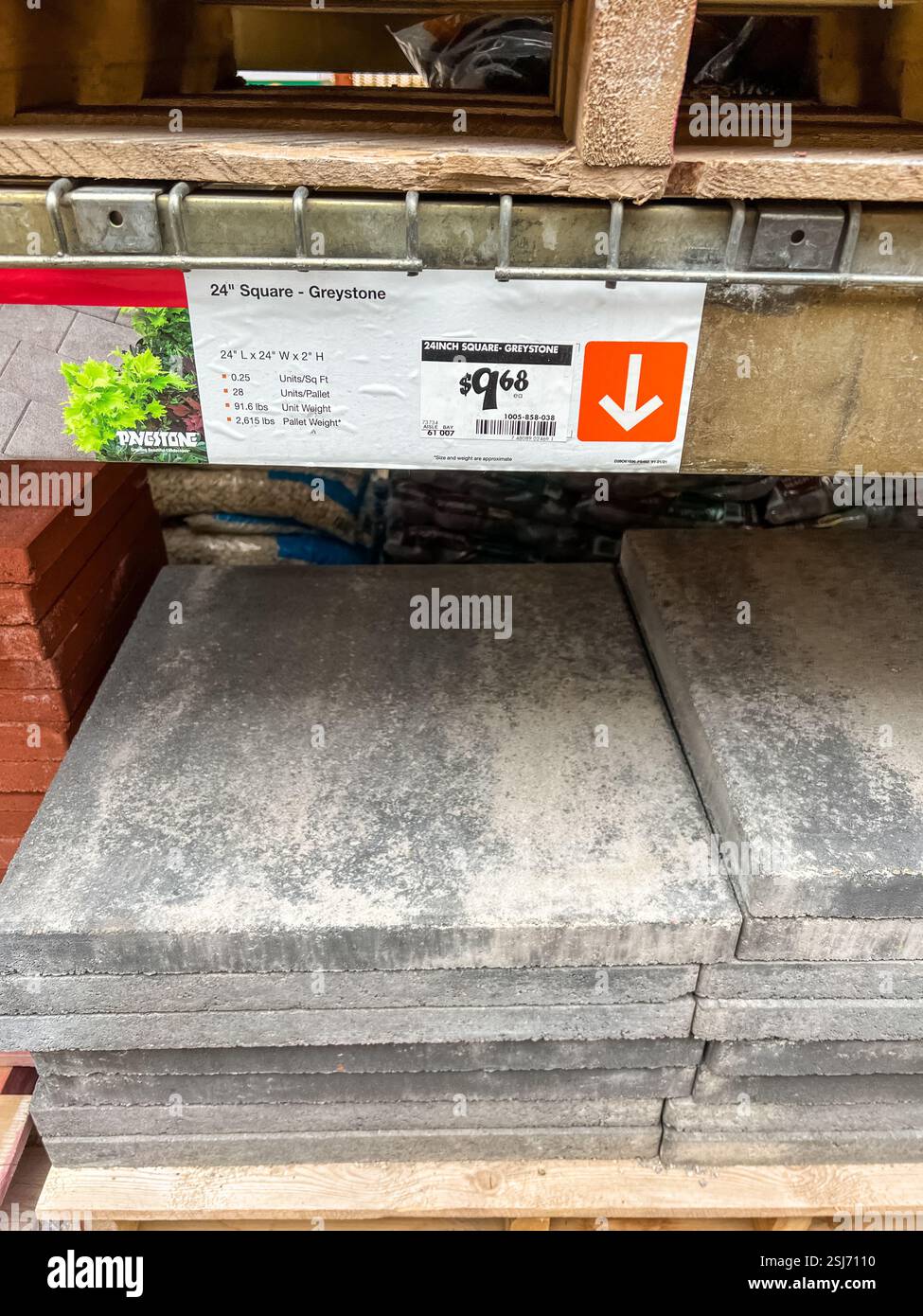 Grey square concrete pavers on display Stock Photo - Alamy