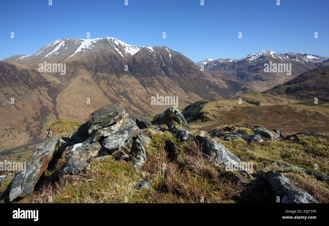 Ben Nevis and the surrounding hills with snow remaining on the summits ...