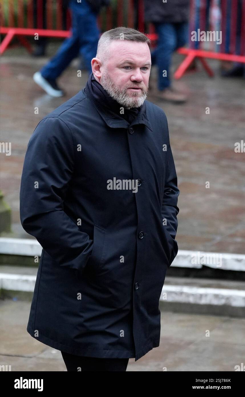 Wayne rooney arriving at manchester cathedral for the funeral of former ...