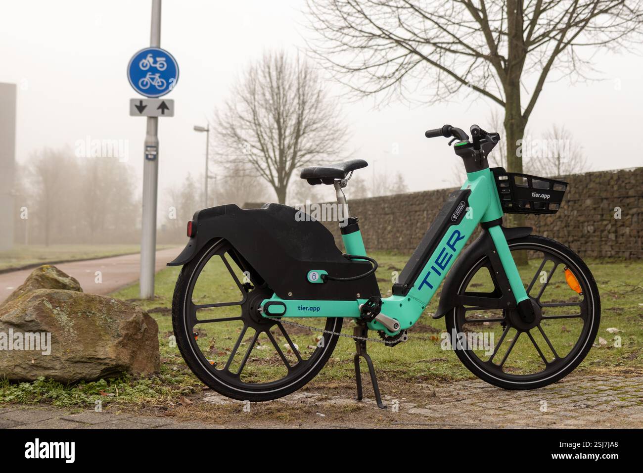 Tier rental electric e-bike left in the streets of Utrecht Stock Photo ...