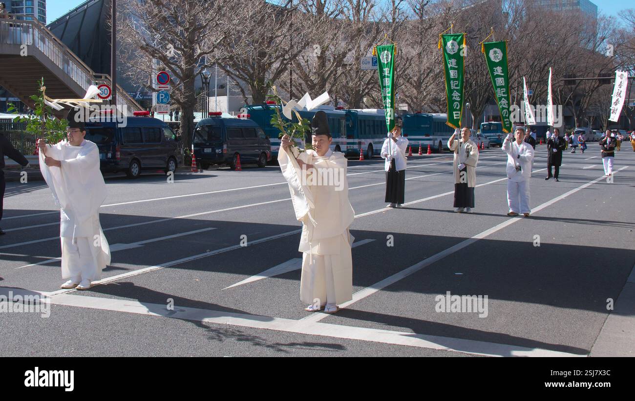Shinto priest performs the "Oharai" (ritual of purification) during the ...