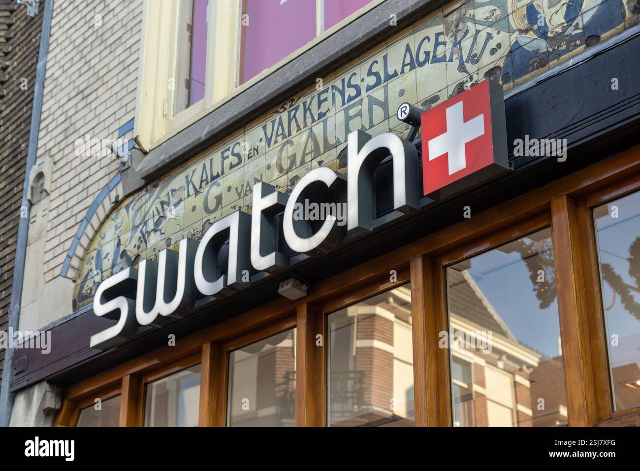 Swatch logo store watches company, sign above a store Stock Photo - Alamy