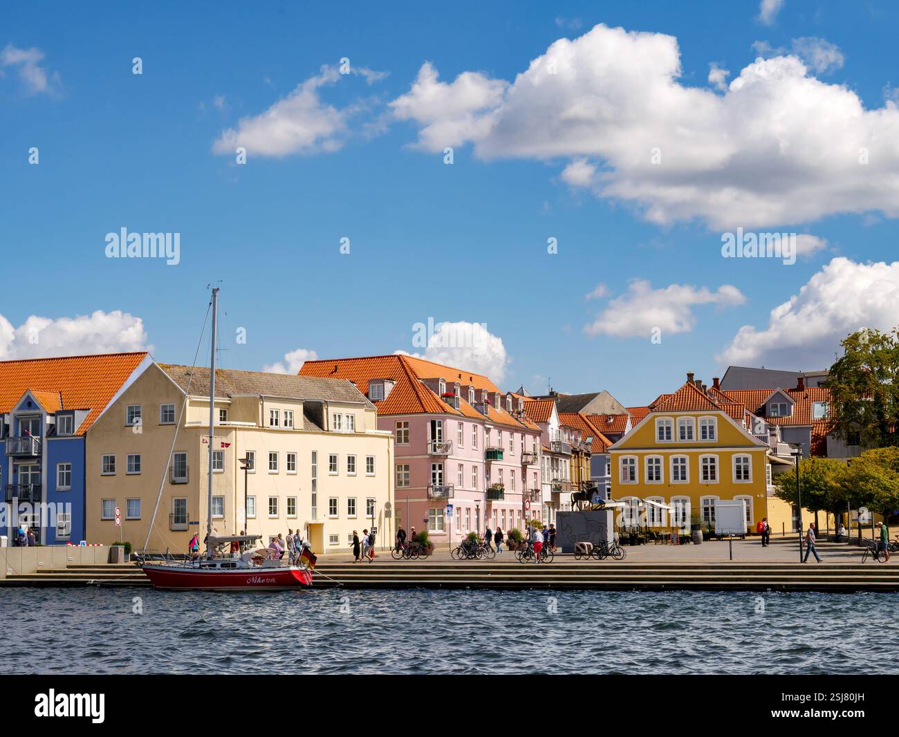 Quayside Sønderbro promenade with square and statue, Sønderborg harbour ...