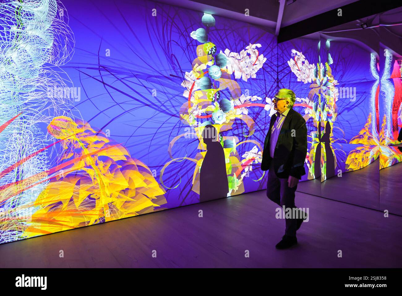 London, UK. 11th Feb, 2025. Artist Miguel Chevalier, immersed in his ...