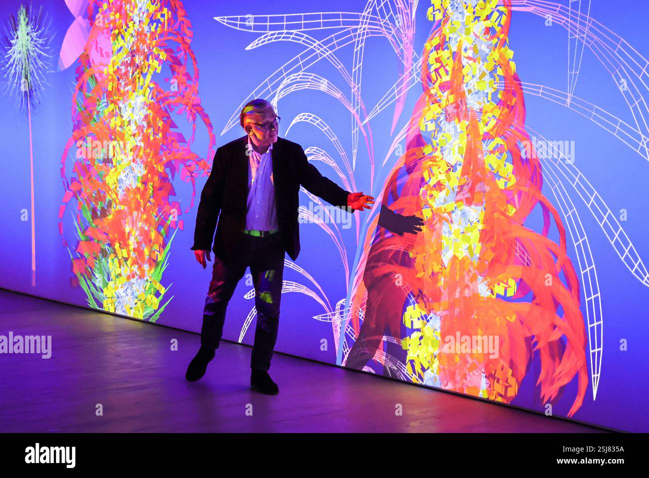 London, UK. 11th Feb, 2025. Artist Miguel Chevalier, immersed in his ...