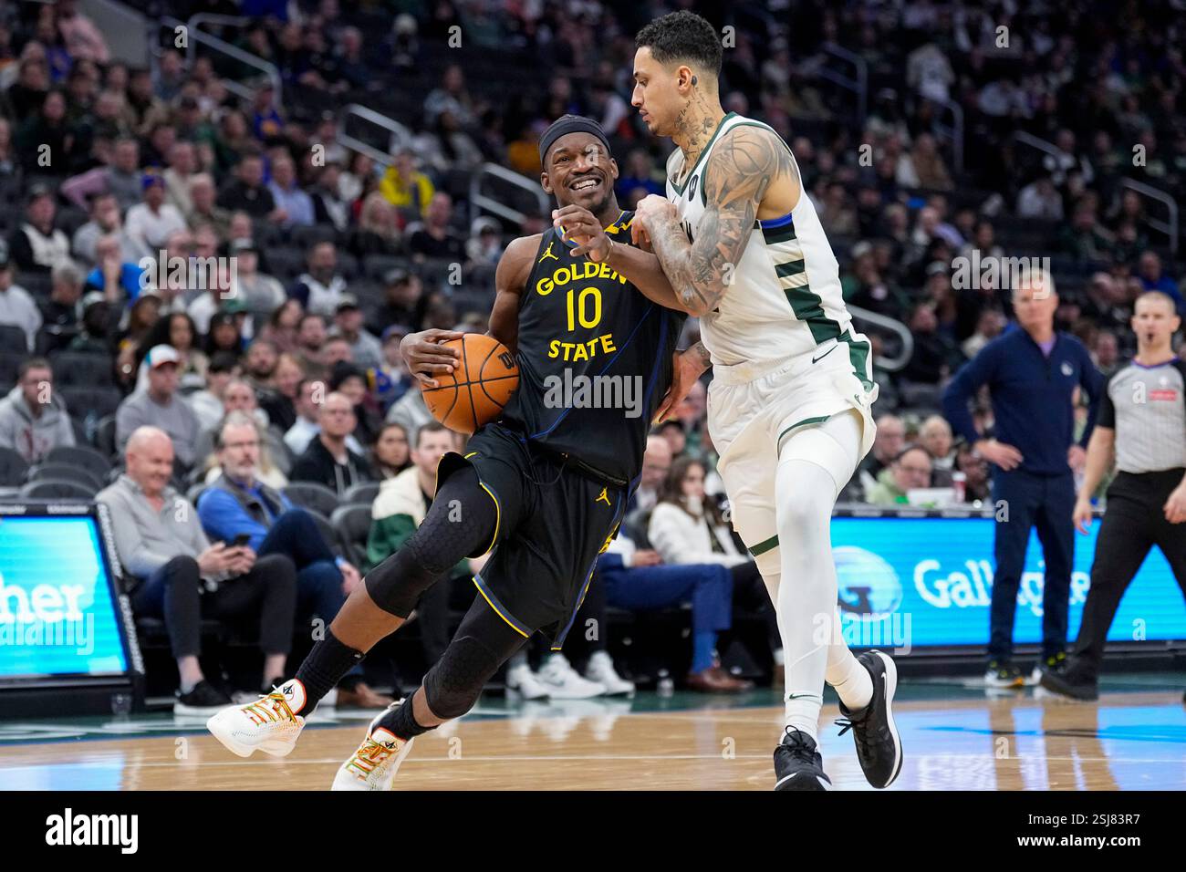Golden State Warriors' Jimmy Butler (10) against Milwaukee Bucks' Kyle ...