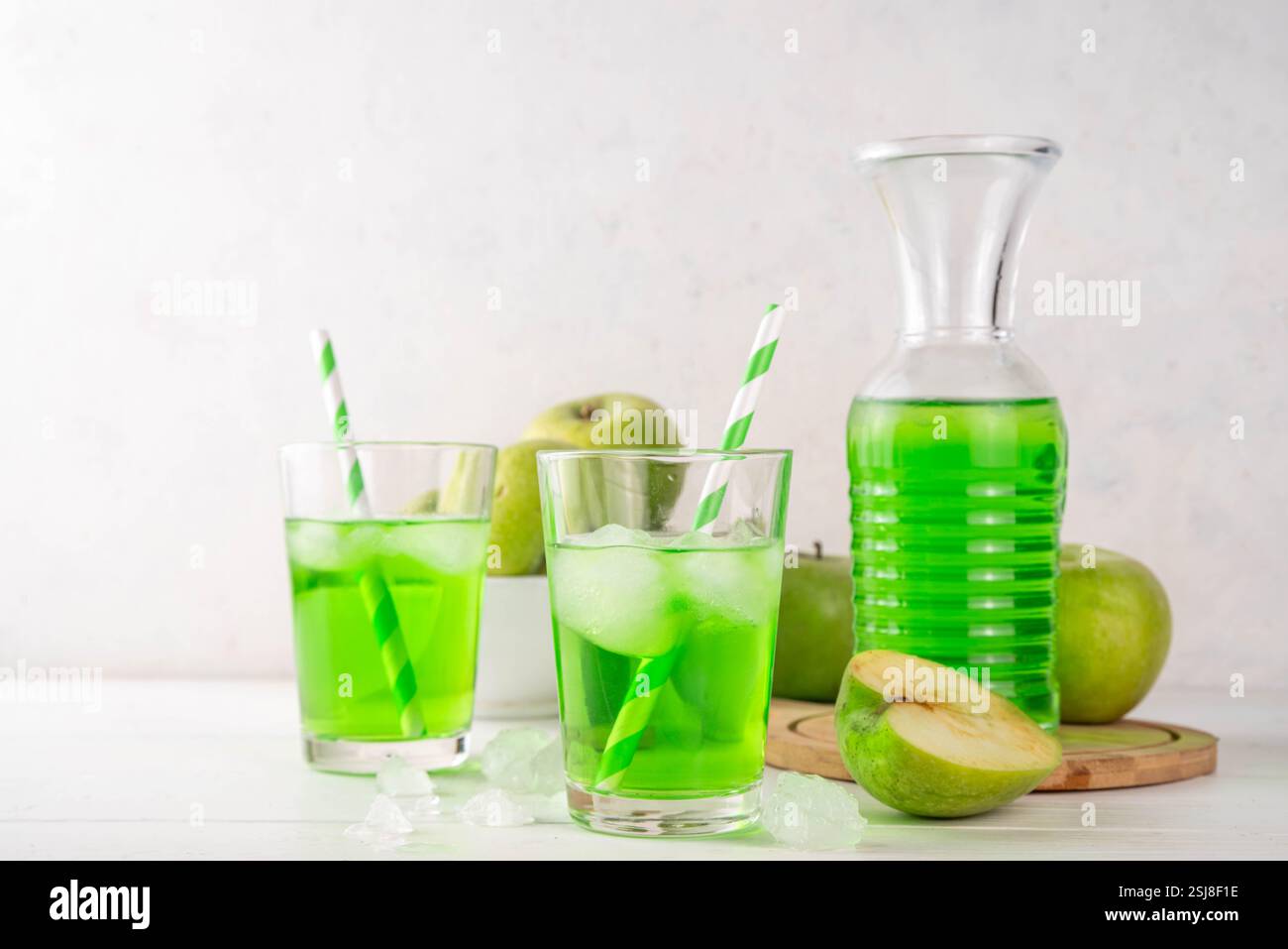 Homemade green apple lemonade cocktail, refreshing summer emerald color ...
