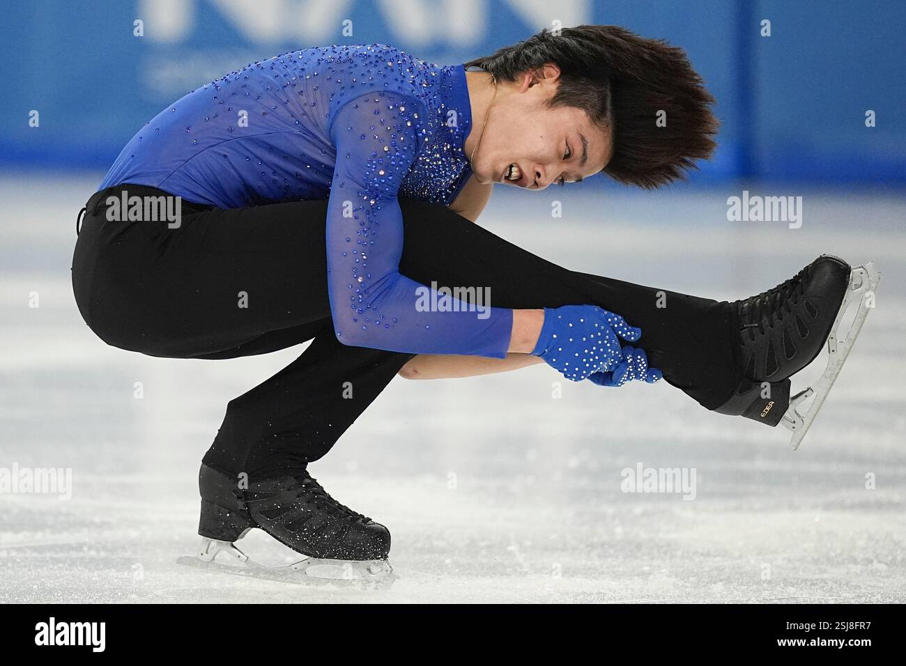 Malaysia's Ze Zeng Fang performs during the men's single skating short ...