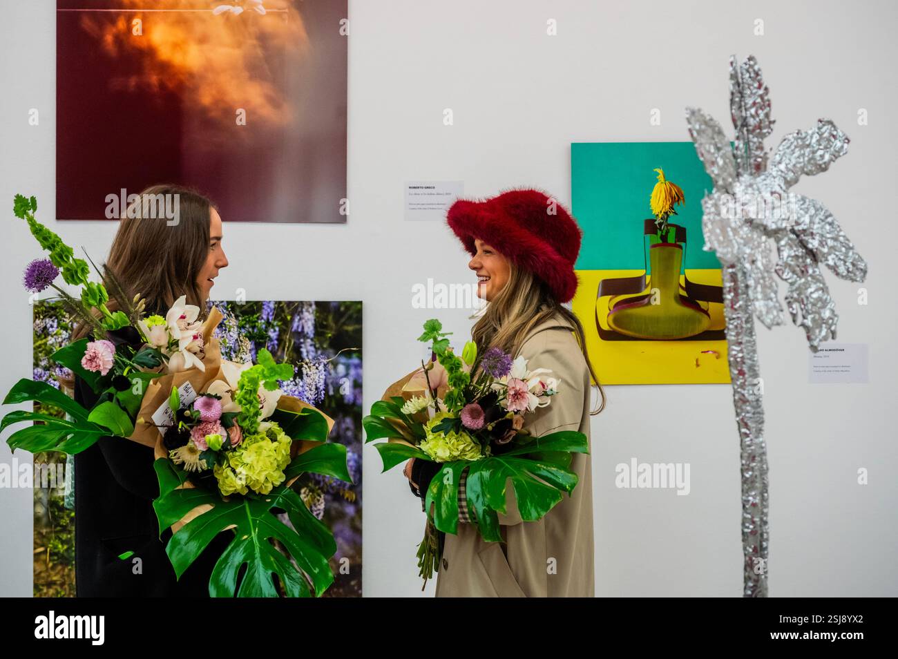 London, UK. 11th Feb, 2025. Visotors, who have been given bunches of ...