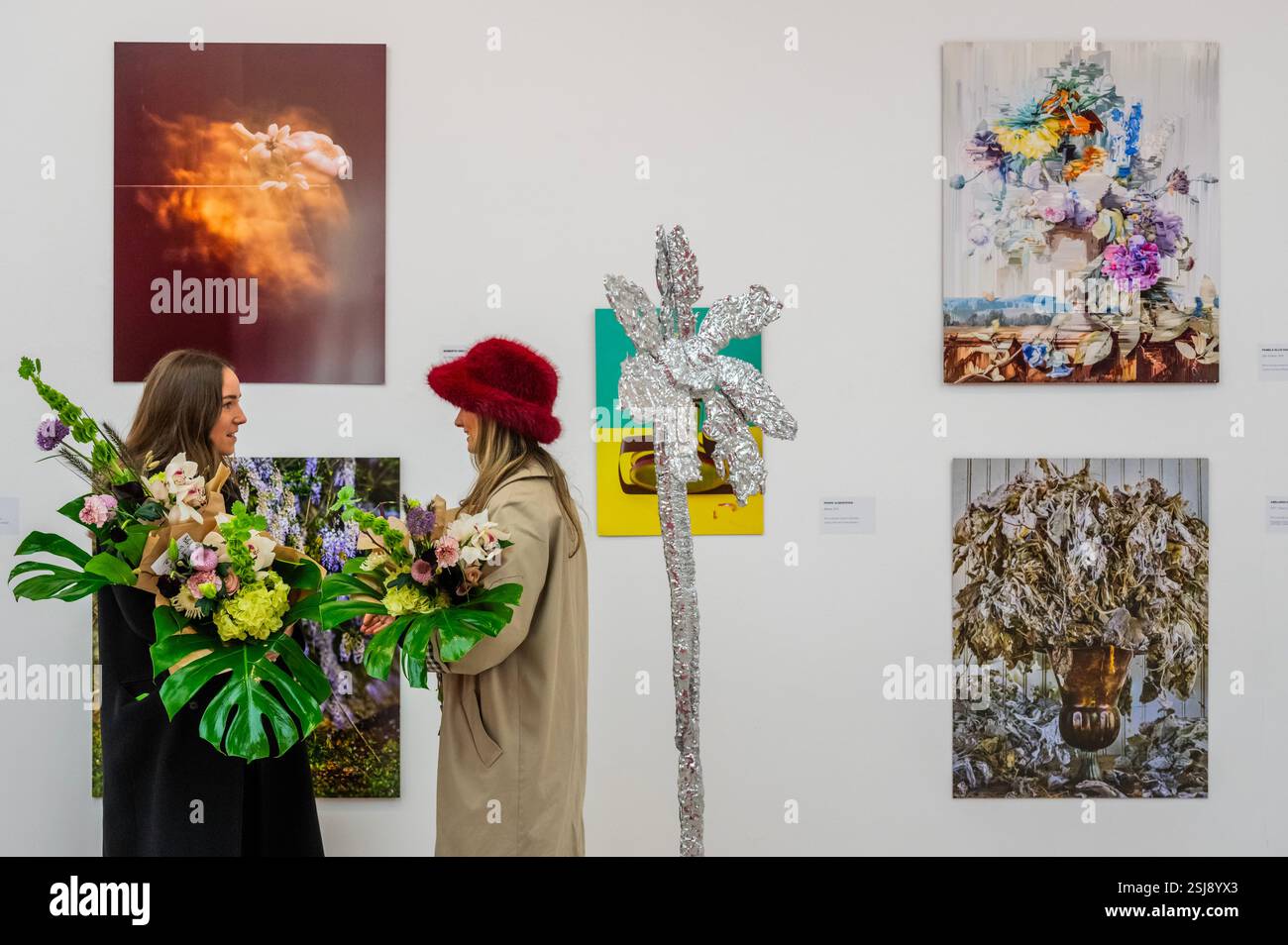 London, UK. 11th Feb, 2025. Visotors, who have been given bunches of ...