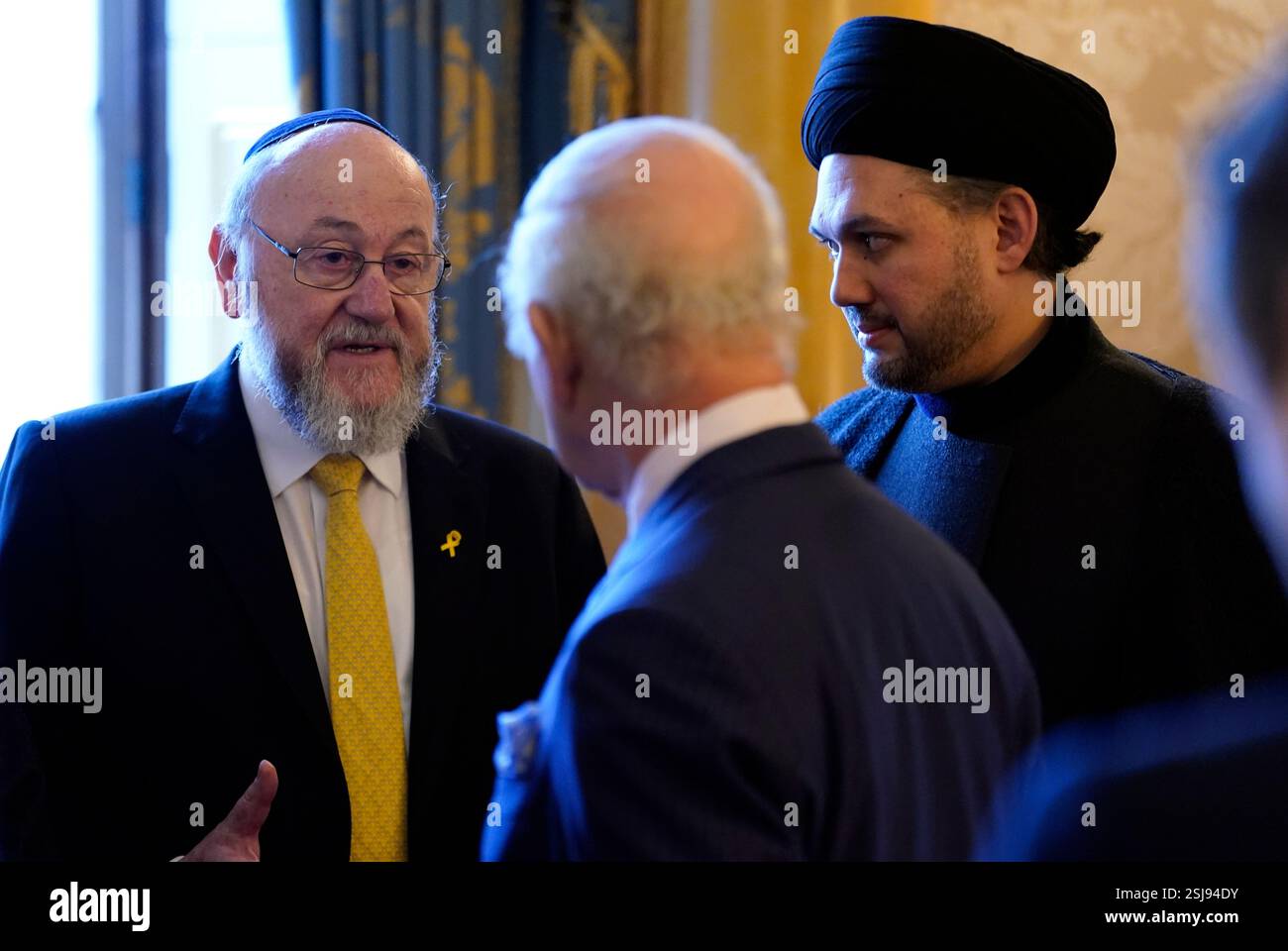 King Charles III (centre) with Chief Imam Dr Sayed Razawi (right ...