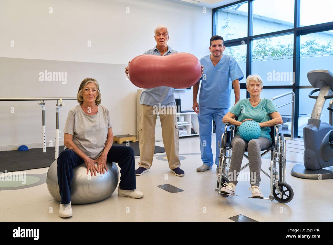 Elderly individuals engaging in rehabilitation activities with a ...