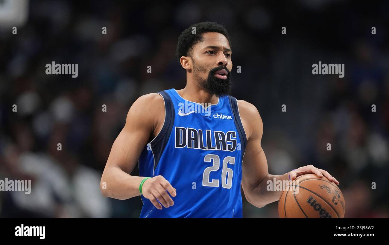 Dallas Mavericks' Spencer Dinwiddie handles the ball during an NBA ...