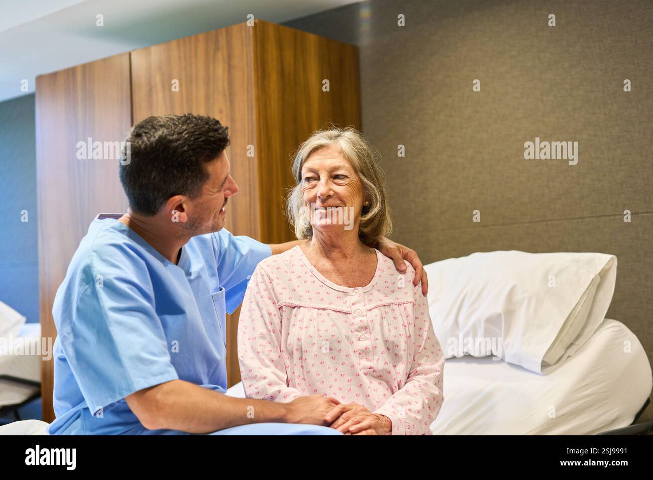 A compassionate nurse providing physical and emotional support to an ...