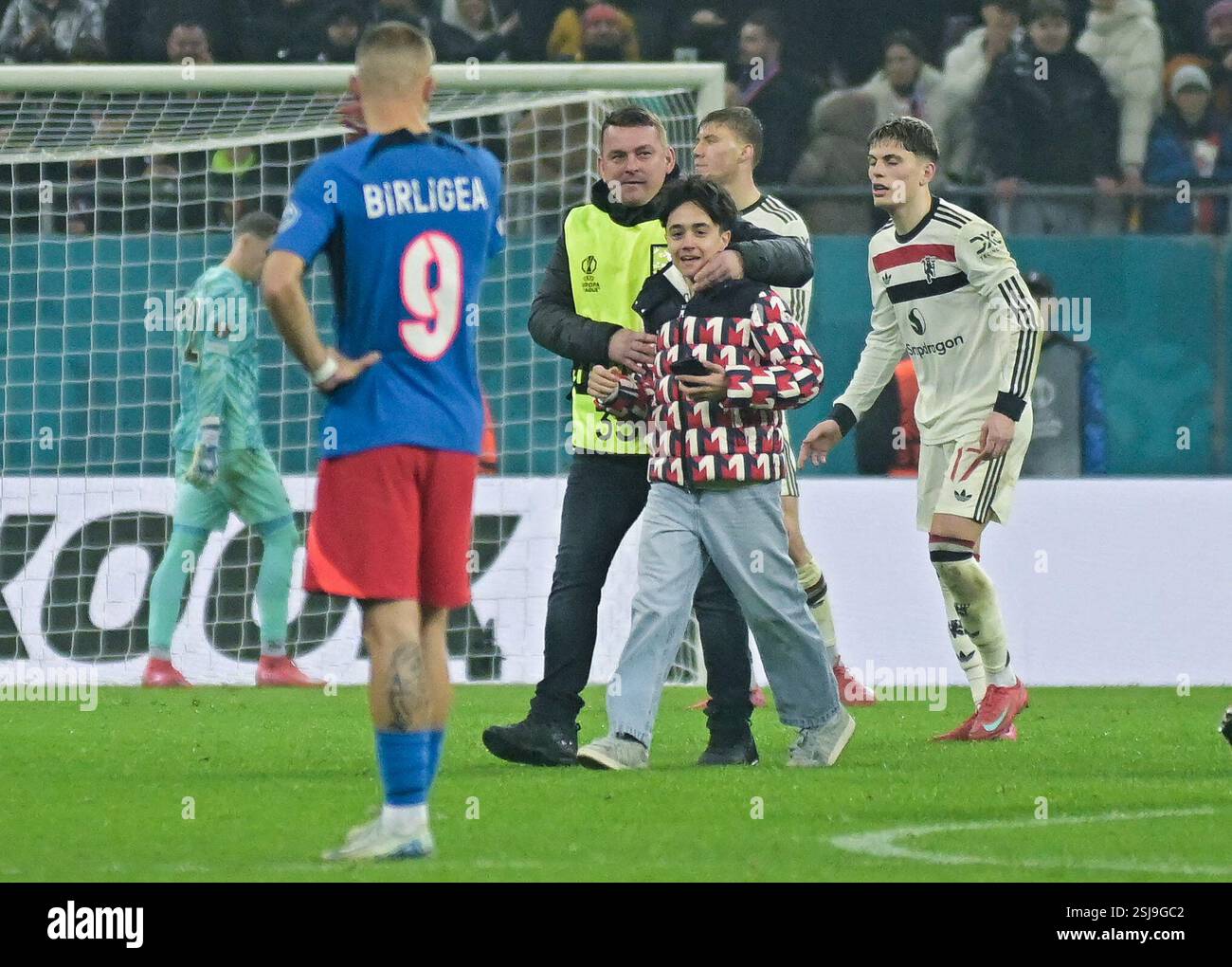 Pitch invader taken off the pitch pictured during the UEFA Europa ...