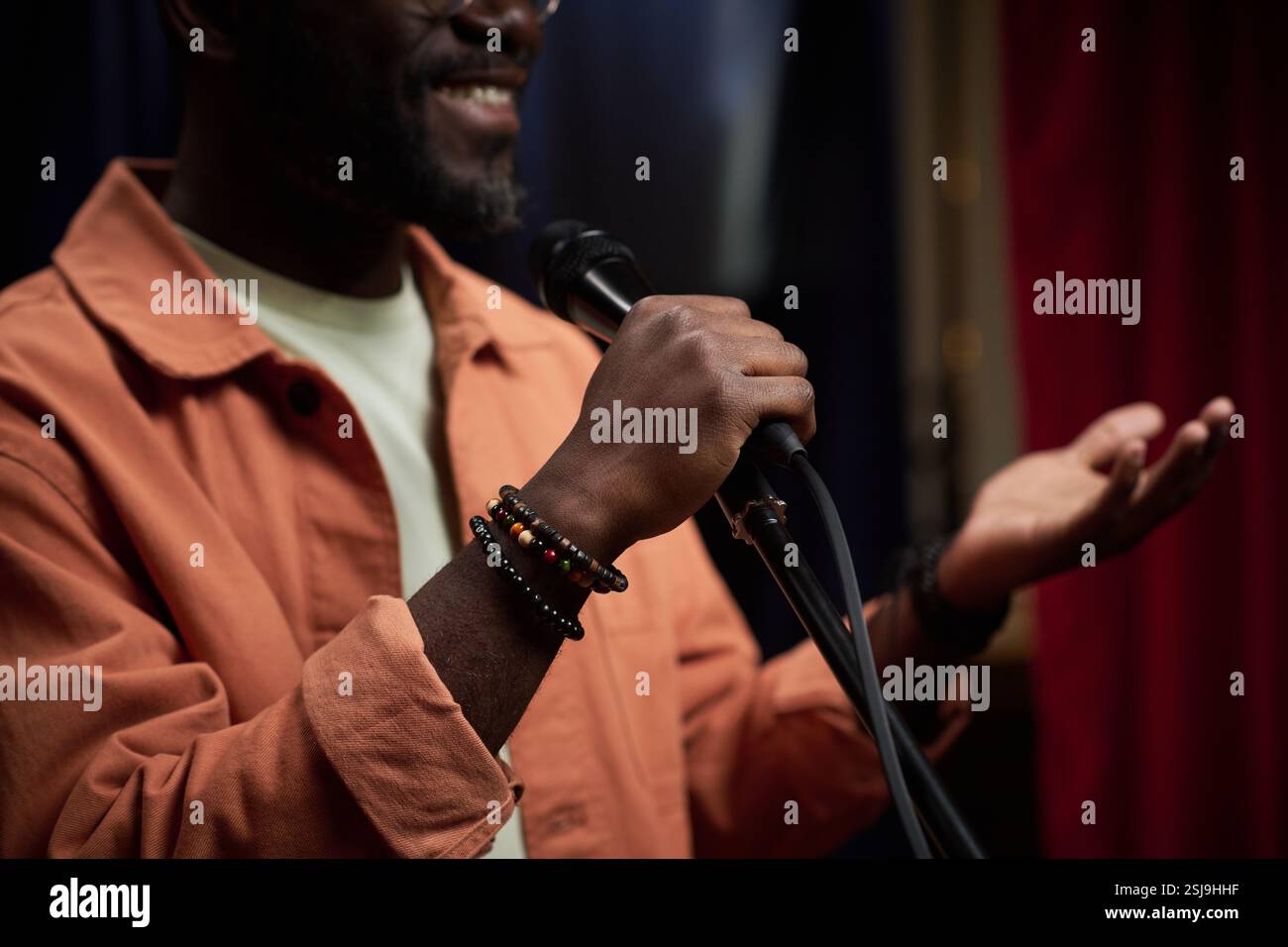Person wearing orange shirt hi-res stock photography and images - Alamy