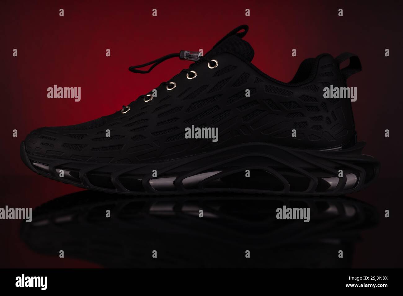 Black Athletic Sneaker with Modern Design Stock Photo - Alamy