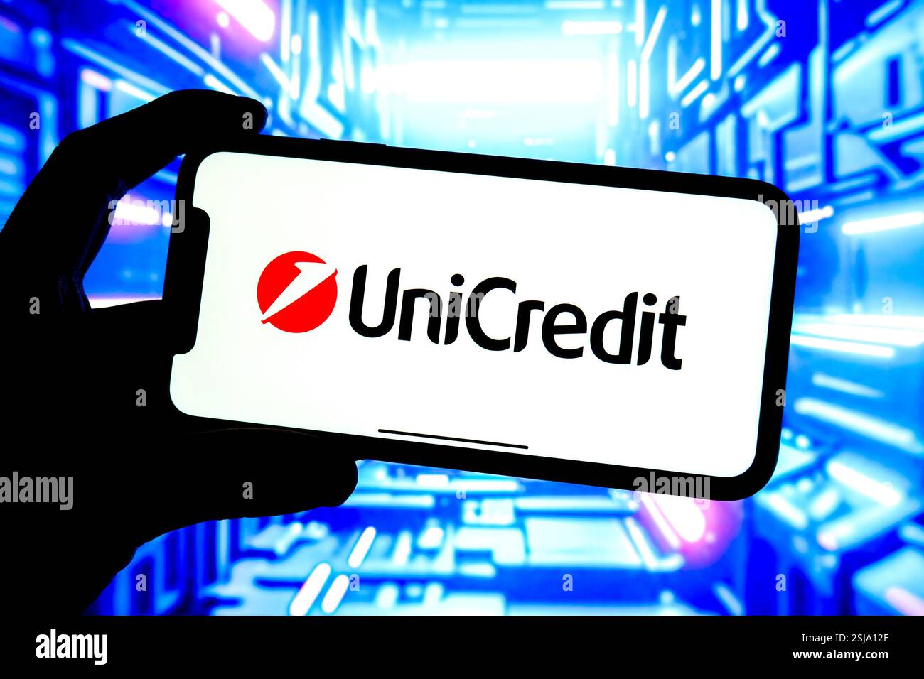 In this photo illustration, a UniCredit logo is seen displayed on the ...