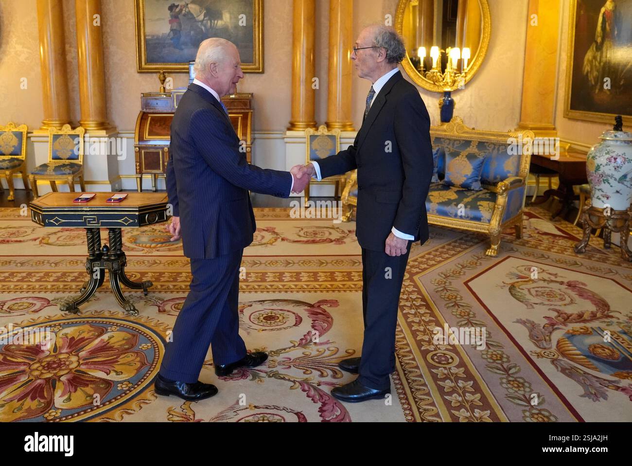 King Charles III (left) meets with Mr Stephen Venables (right) before ...