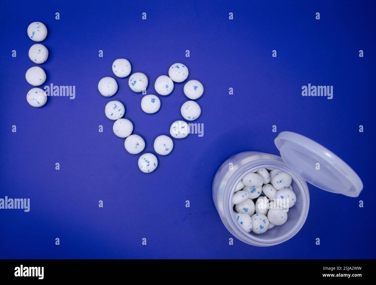 A concept of a jar of chewing gum on a blue background for National ...