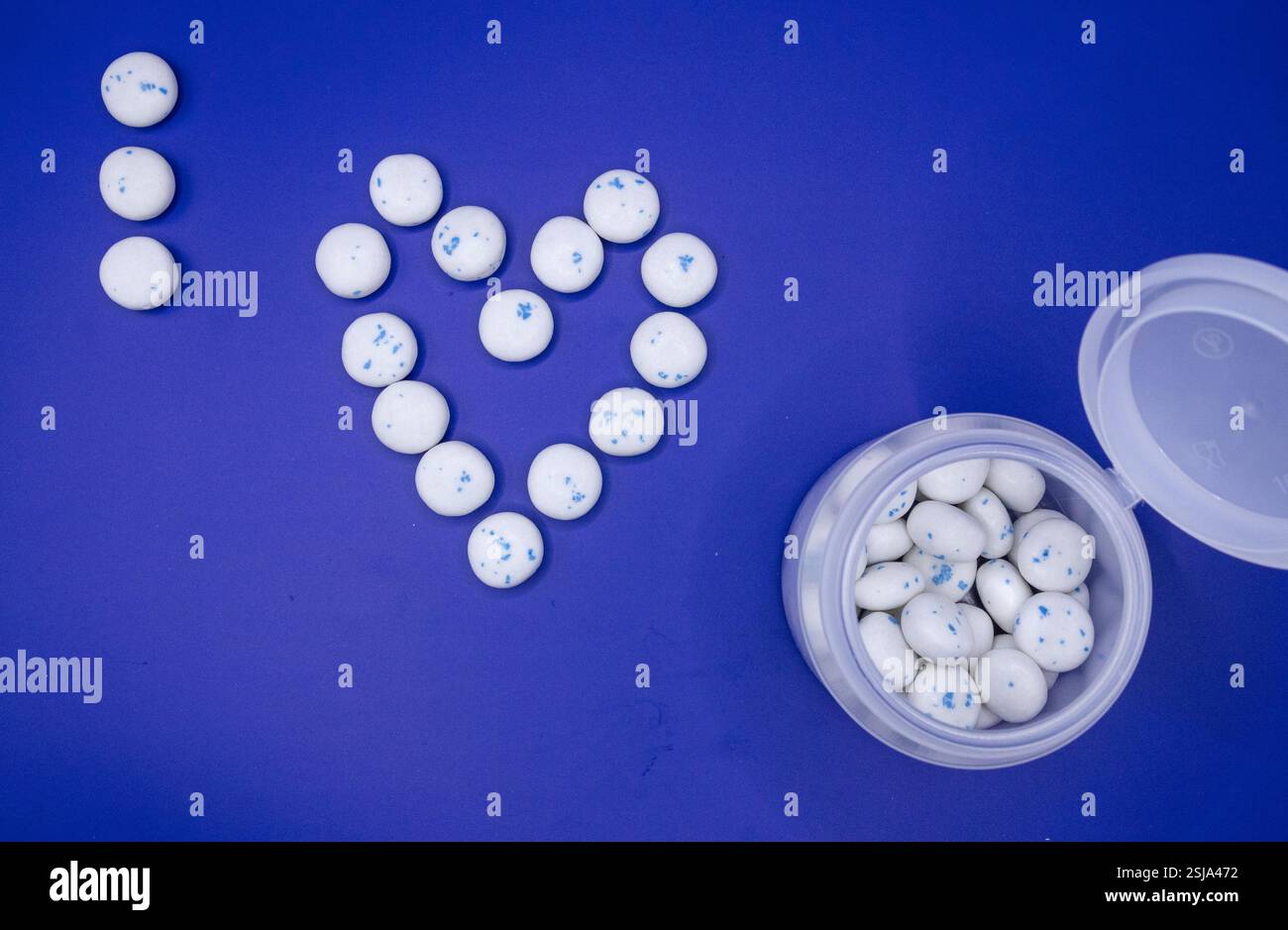 A concept of a jar of chewing gum on a blue background for National ...