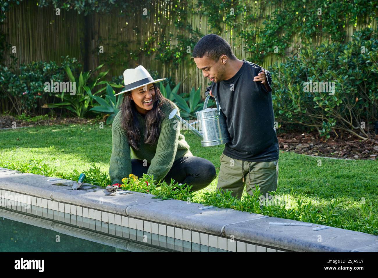 Woman and man with phocomelia gardening Stock Photo - Alamy