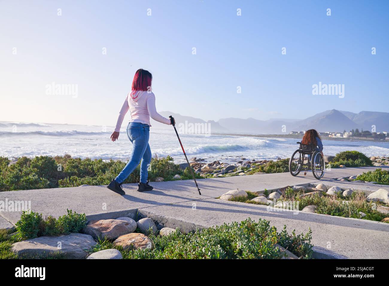 Disabled women on coastal footpath Stock Photo - Alamy
