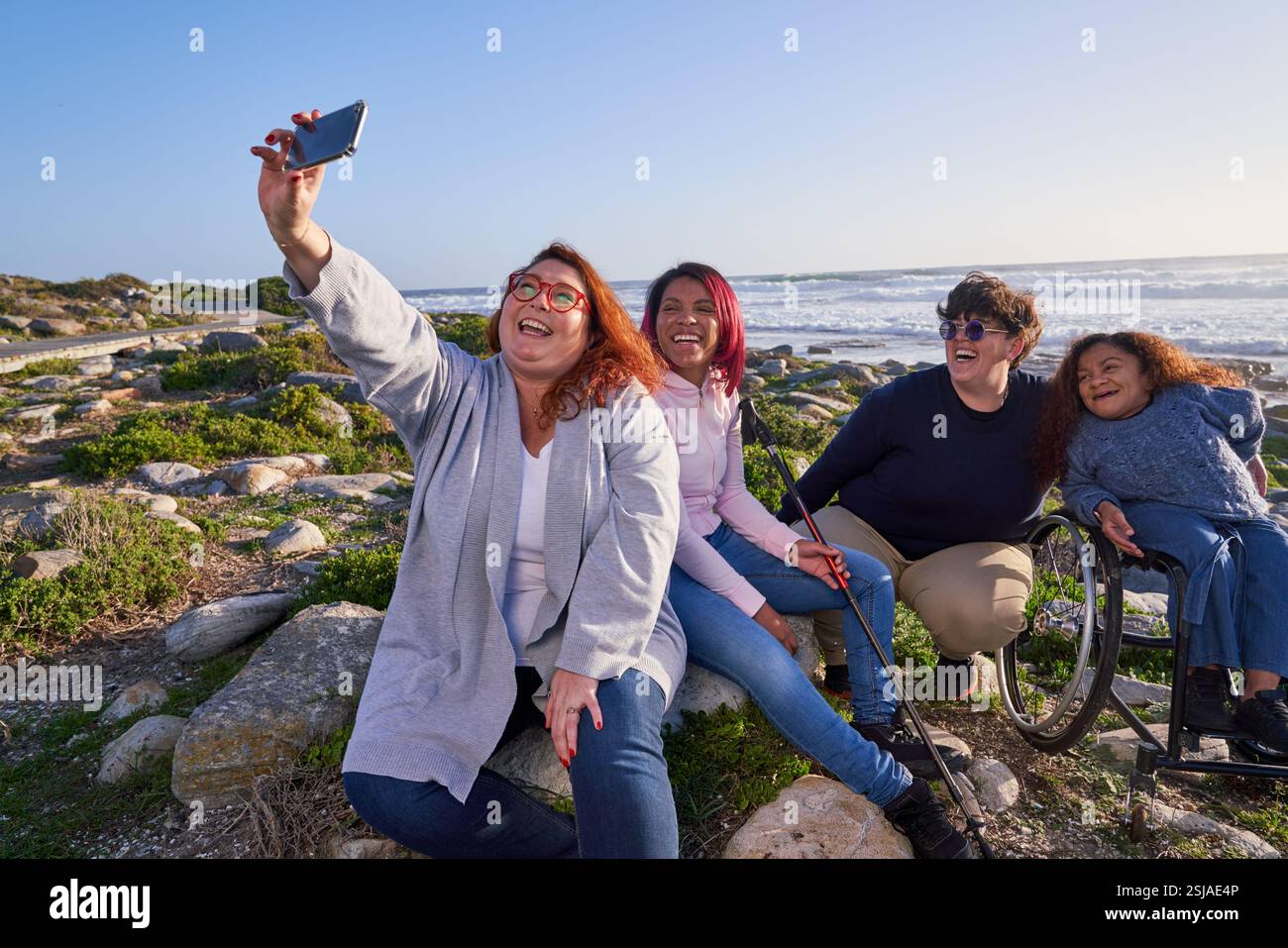 Disabled friends taking selfie outdoors Stock Photo - Alamy