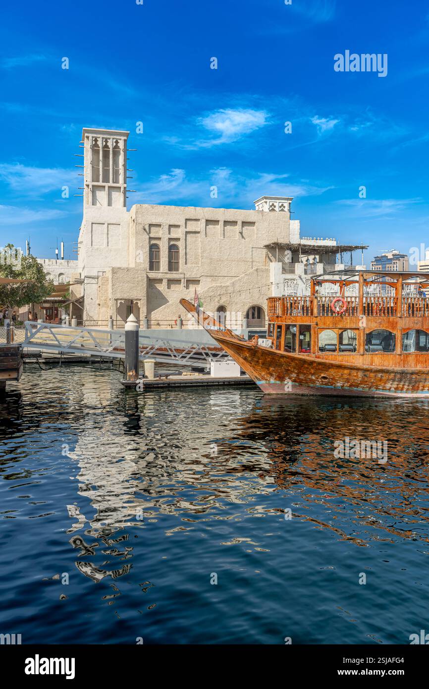 Al Seef docks on the south side of the Dubai Creek. Rustic buildings ...