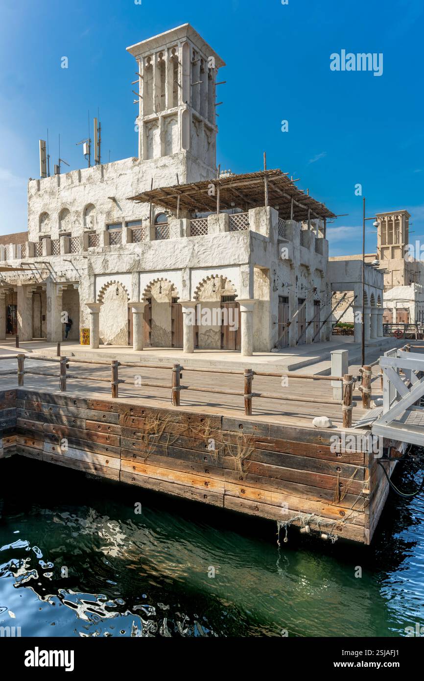 Al Seef docks on the south side of the Dubai Creek. Rustic buildings ...
