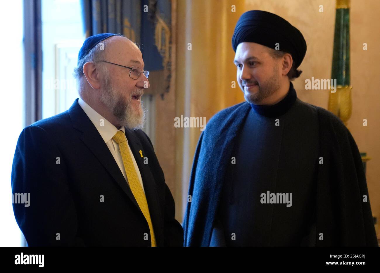 Chief Rabbi Sir Ephraim Mirvis (left) chats with Chief Imam Dr Sayed ...