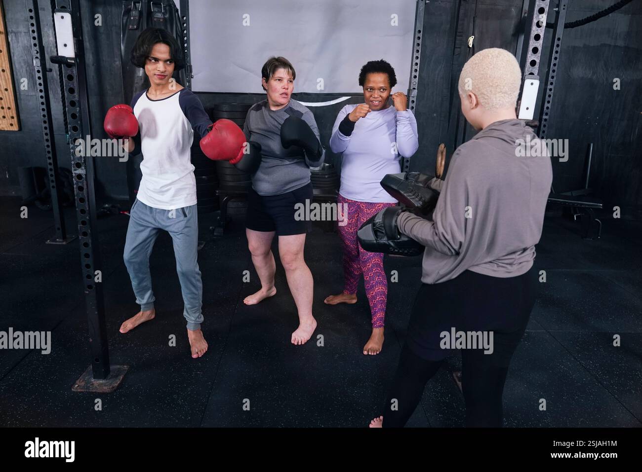 Young people practicing sports hi-res stock photography and images - Alamy