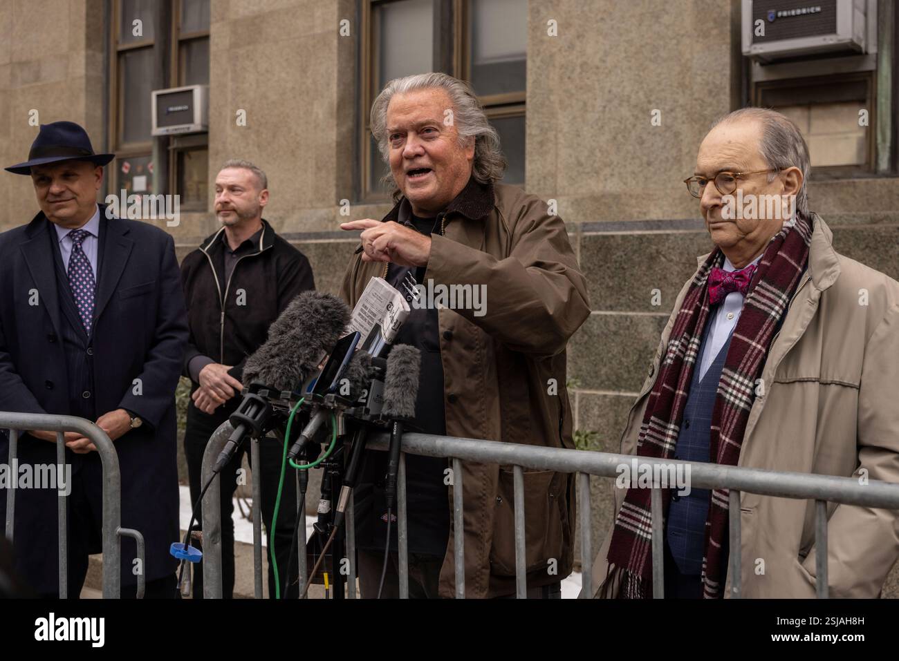 Steve Bannon speaks to reporters outside court in New York, Tuesday ...