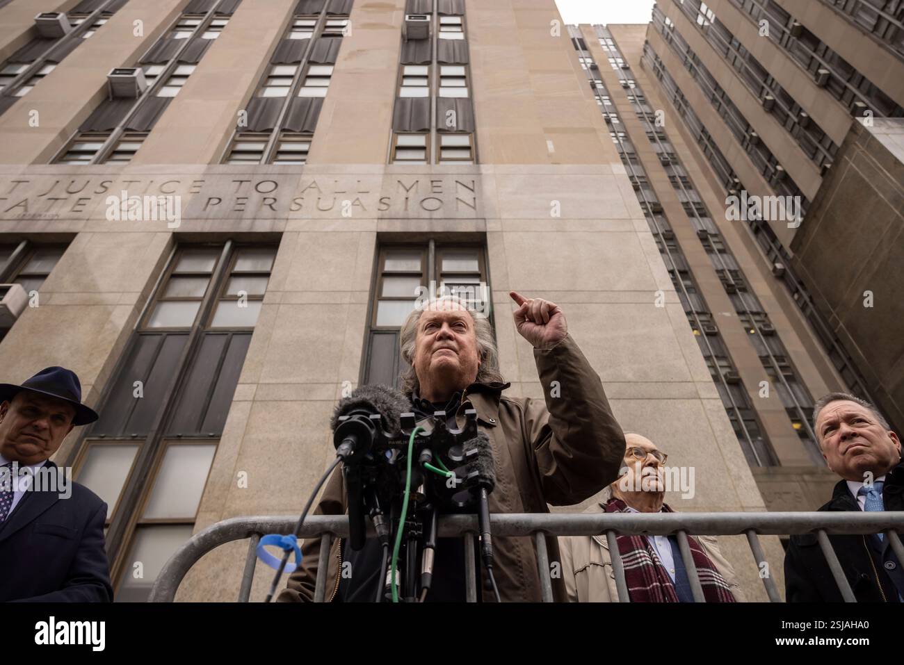 Steve Bannon speaks to reporters outside court in New York, Tuesday ...