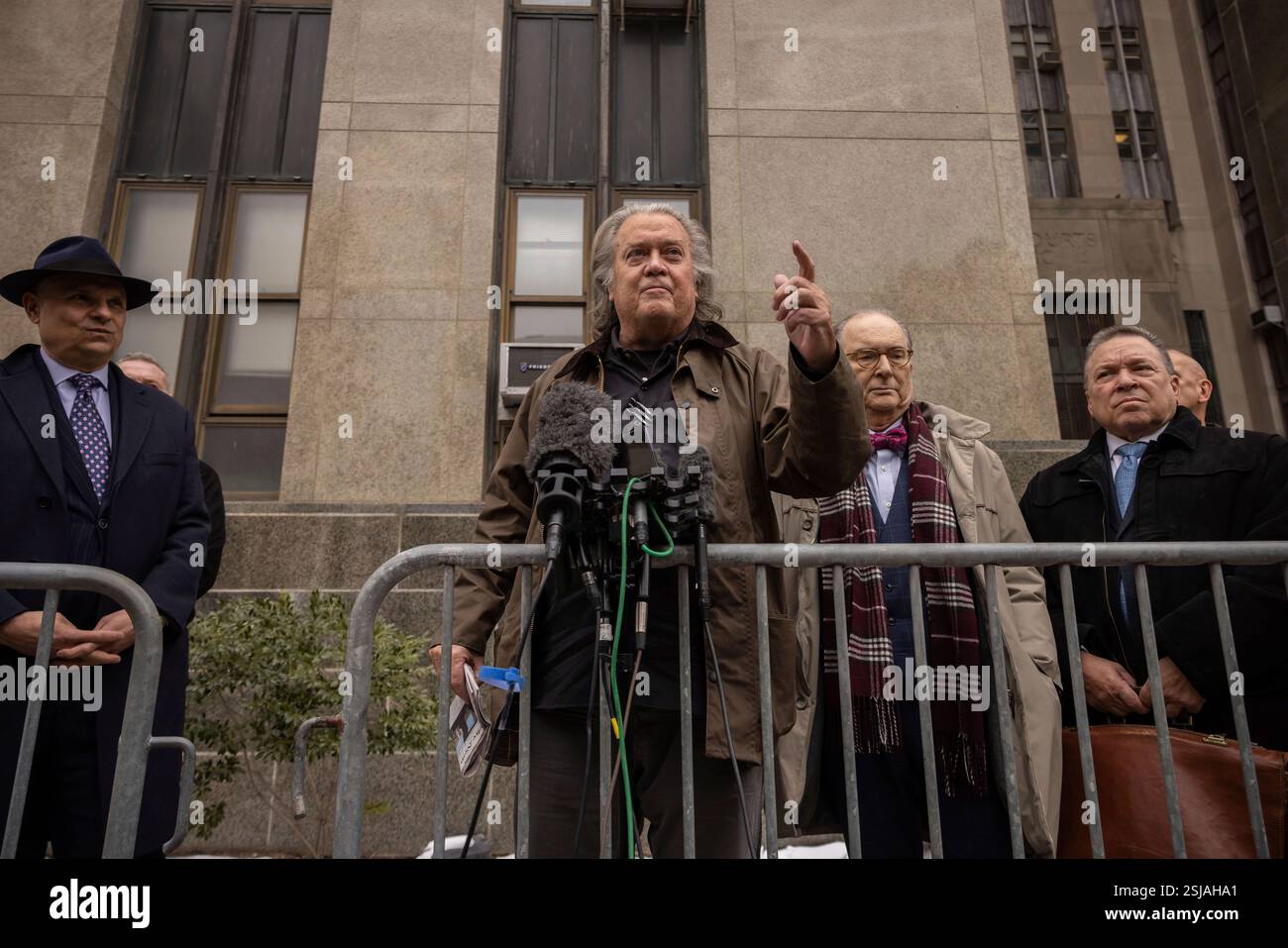 Steve Bannon speaks to reporters outside court in New York, Tuesday ...