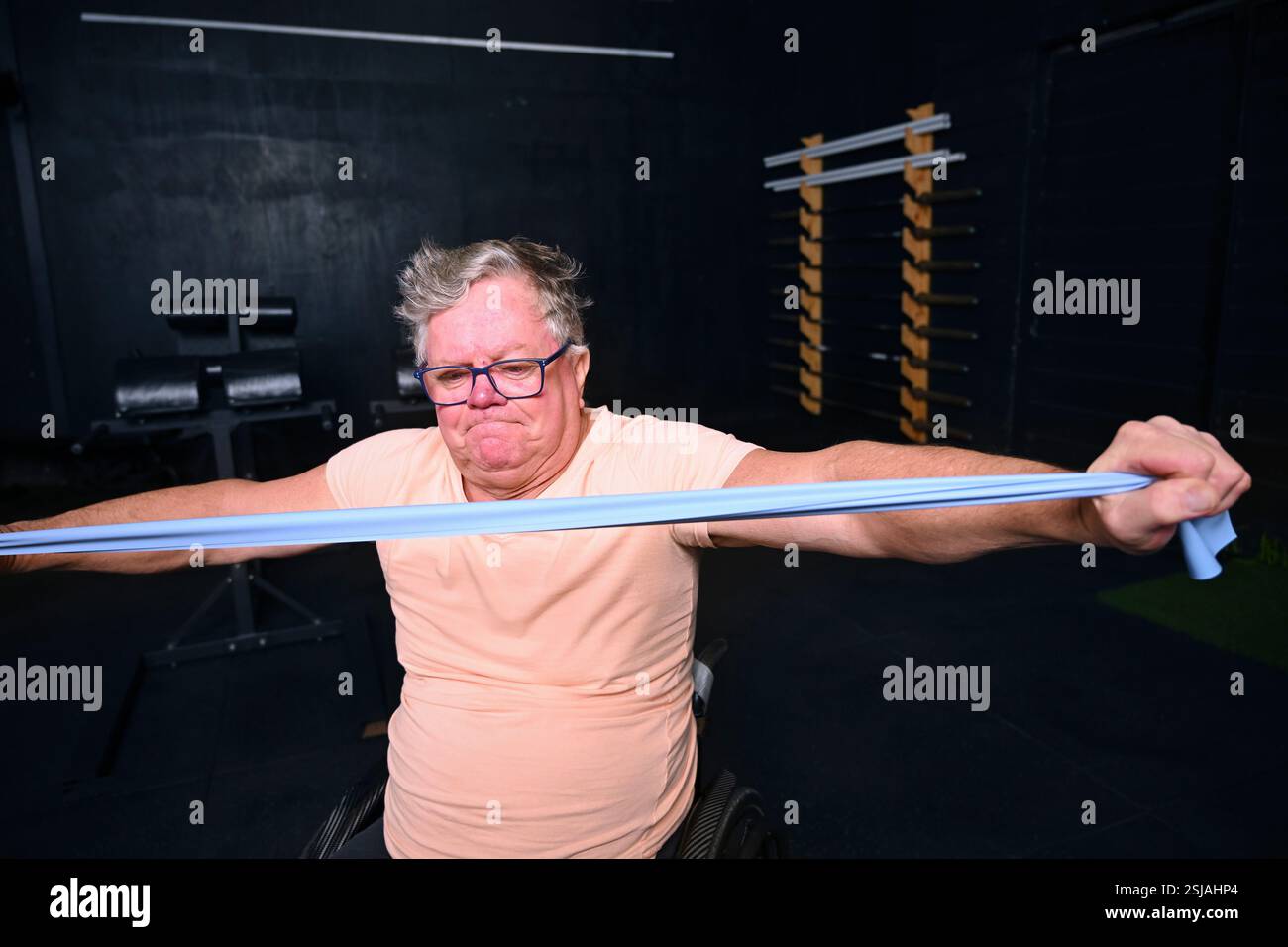Man in wheelchair exercising arms hi-res stock photography and images ...