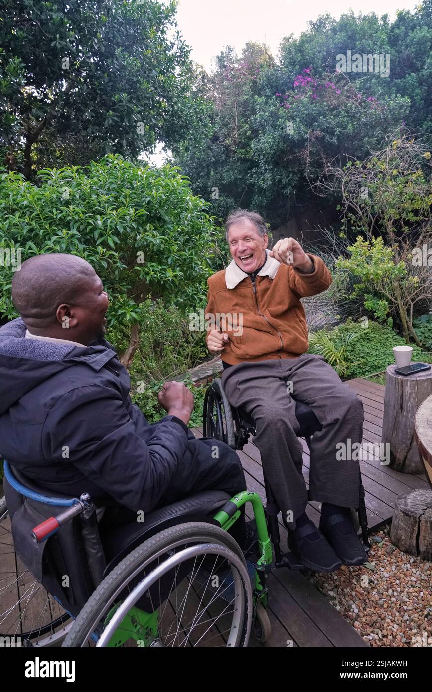Two people in wheelchairs hi-res stock photography and images - Alamy