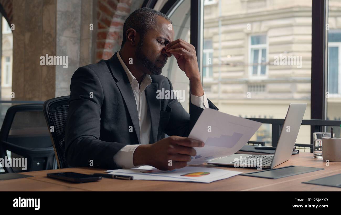 Stressed upset failure paperwork stress problem troubled African ...