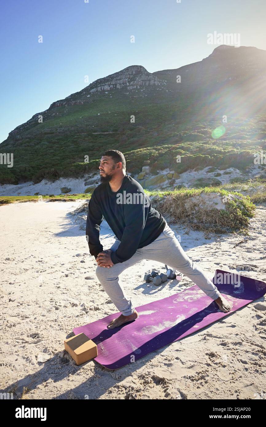 Man practicing stretching yoga hi-res stock photography and images - Alamy