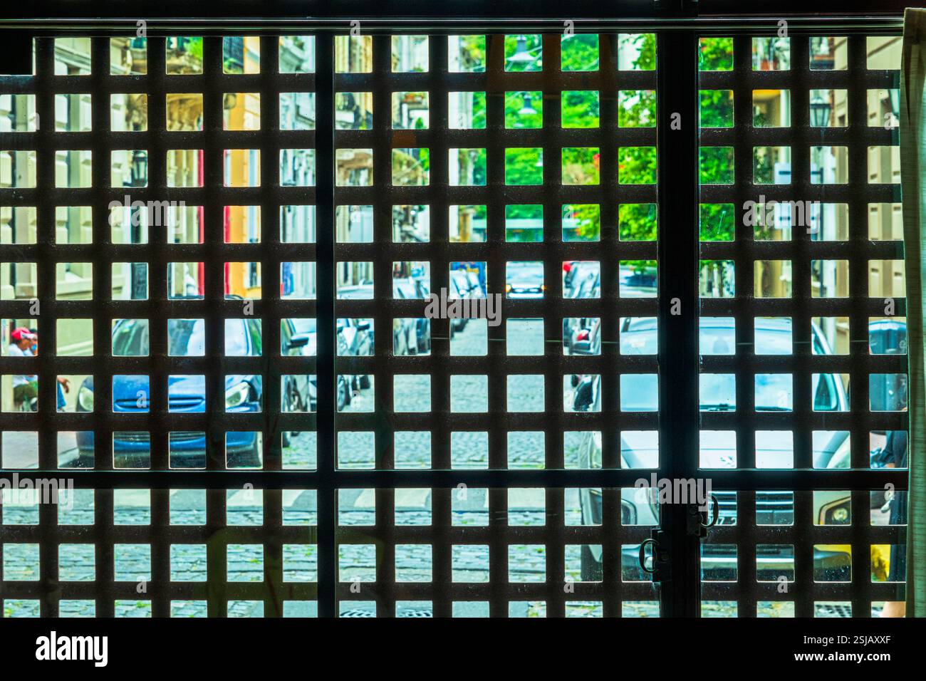 This large barred window allows a unique street view outside the El ...