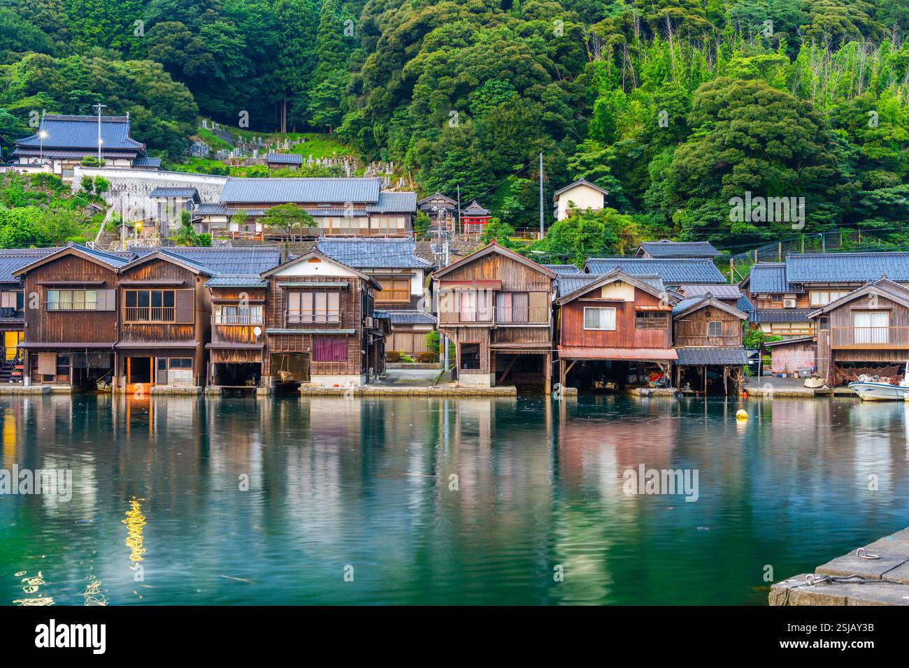 Kyoto, Japan at Ine Bay historic funaya boathouses at dusk Stock Photo ...