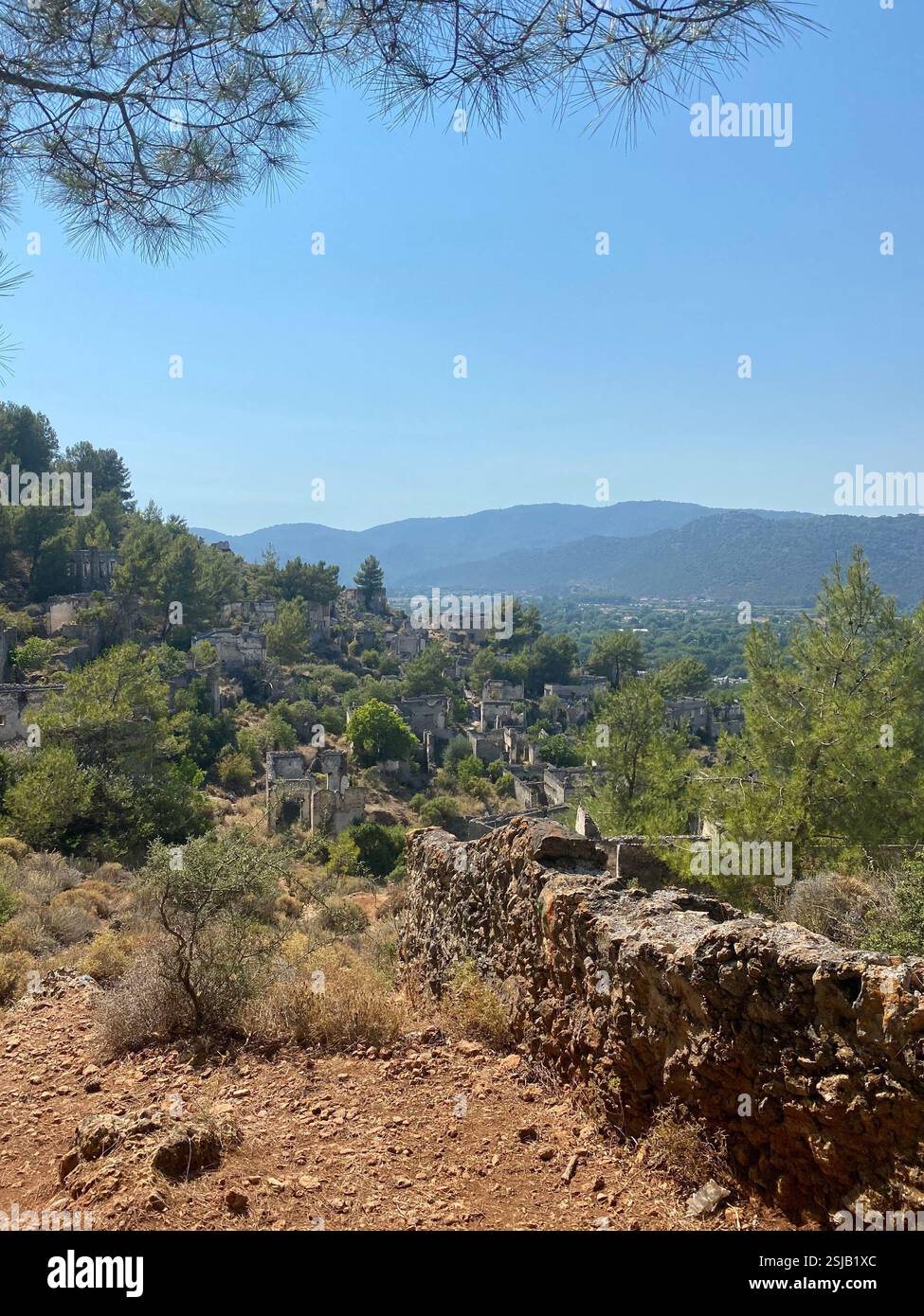 A scenic view of the abandoned ghost village in the mountains of ...
