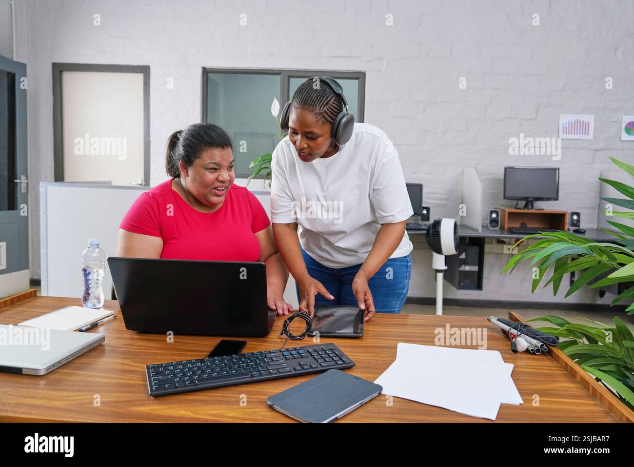 Group businesswomen using digital hi-res stock photography and images ...