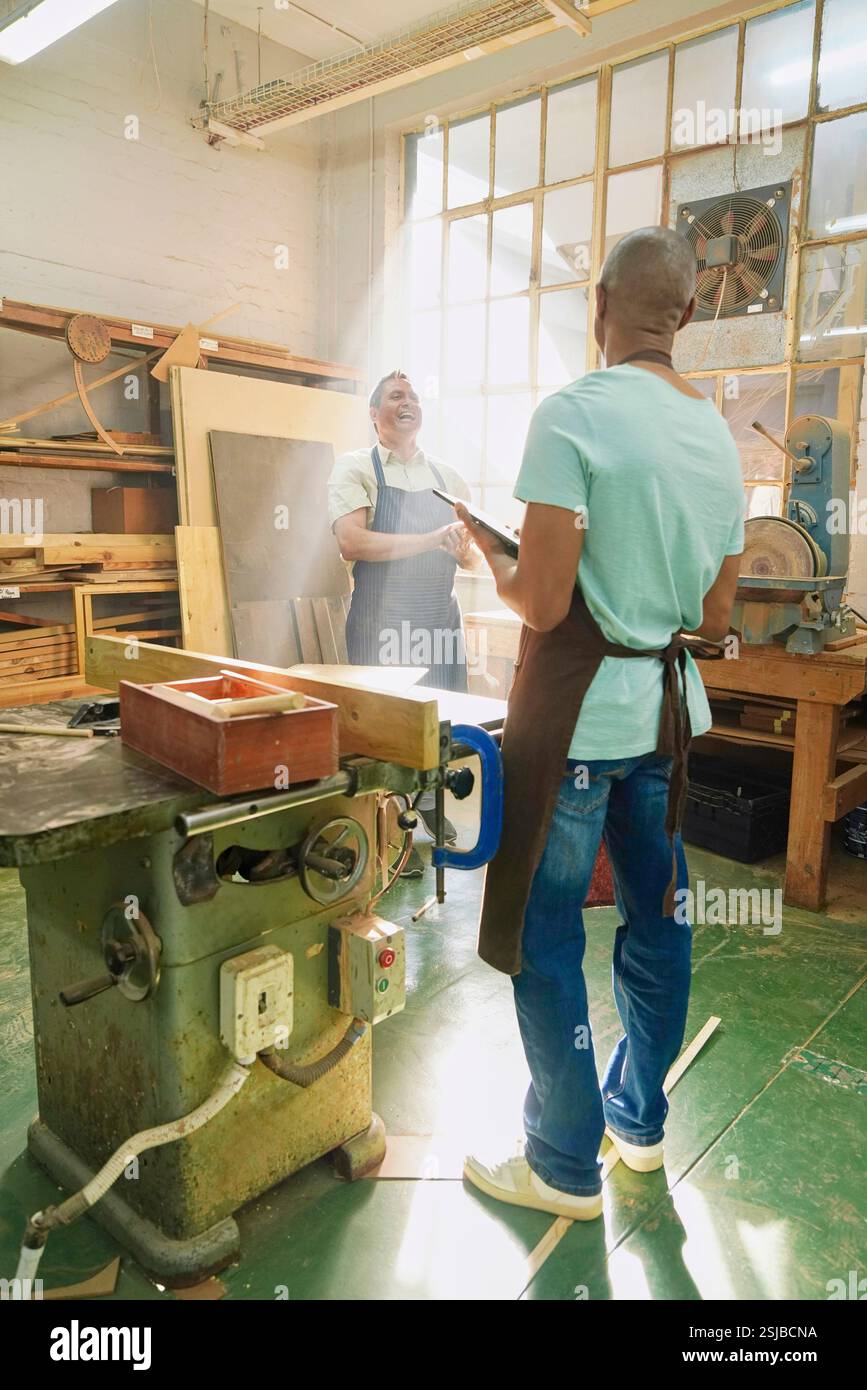 Visually impaired men in wood shop Stock Photo - Alamy