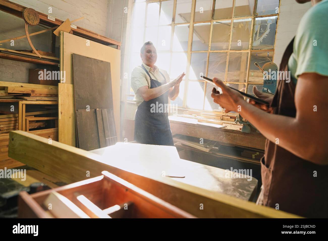 Visually impaired men in wood shop Stock Photo - Alamy