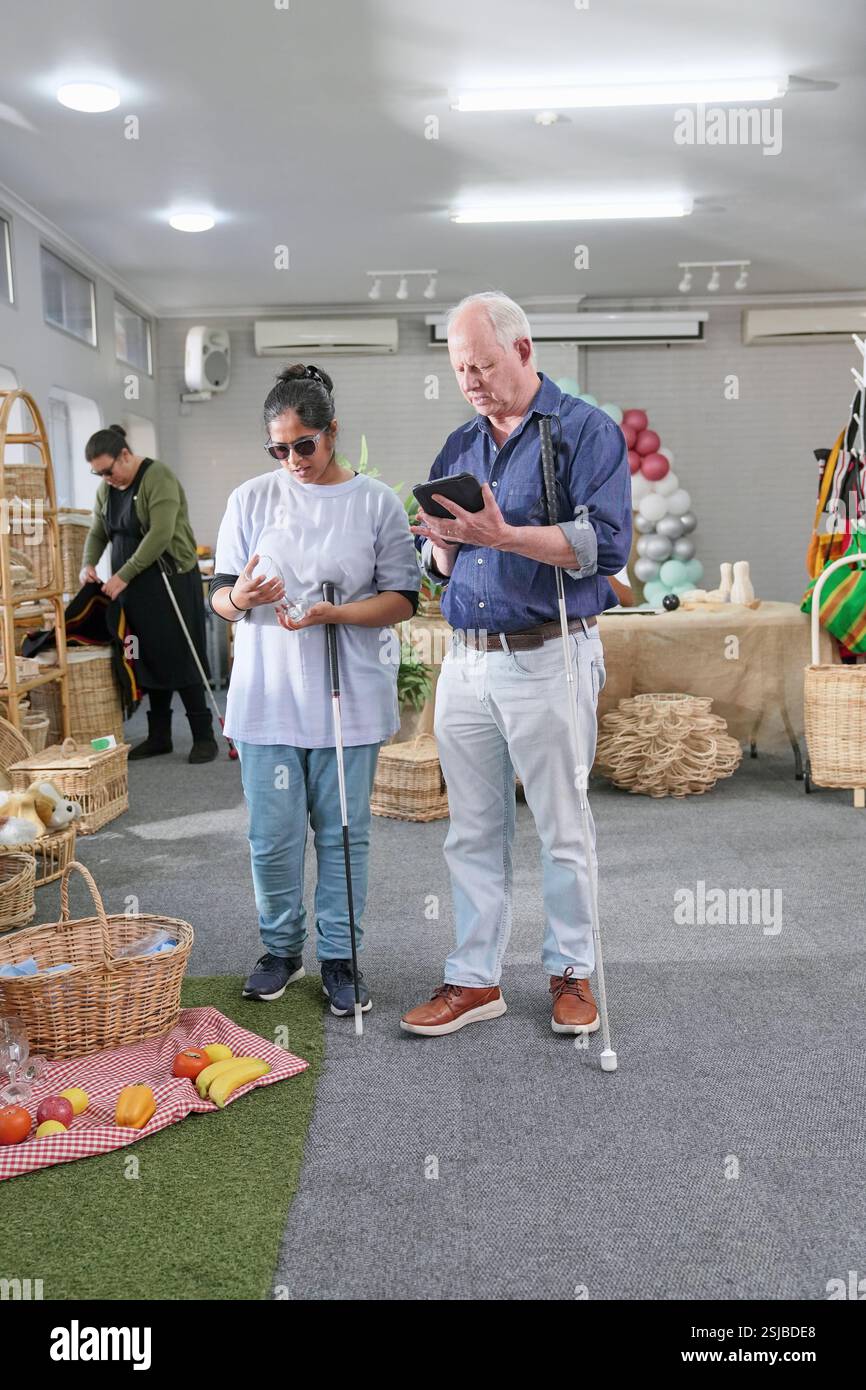 Visually impaired people in store Stock Photo - Alamy